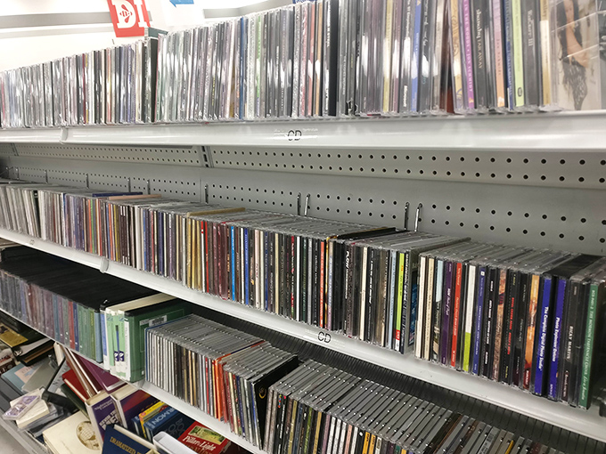 Musical memories line these shelves, each CD a time capsule waiting to transport you back to your favorite decade.