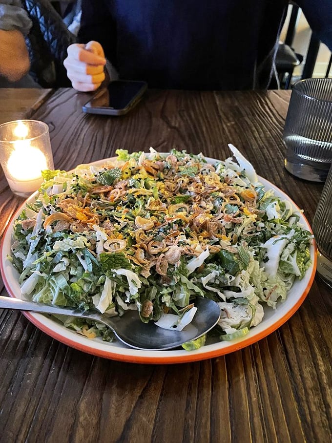 This Caesar salad got a Filipino makeover and now it's living its best life, with crispy toppings that make regular croutons seem like underachievers.