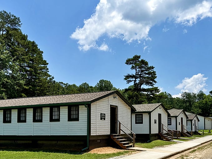These humble white barracks trained the men who would jump into history, their simple architecture a reminder of extraordinary times.