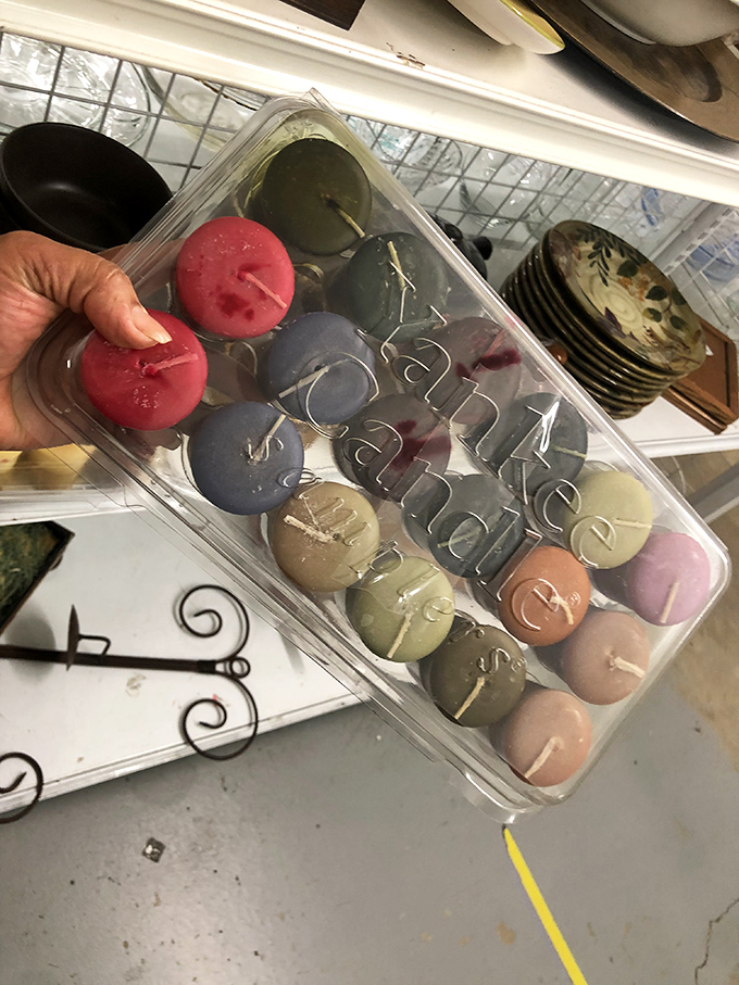 Peace candles arranged like a colorful edible display. These waxy treasures could transform someone's bathroom into a spa-like retreat for mere dollars.