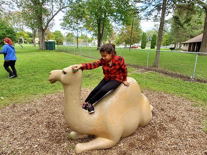 Carroll Park's playgrounds welcome grandkids and the young-at-heart. That camel won't judge if you need help getting down.