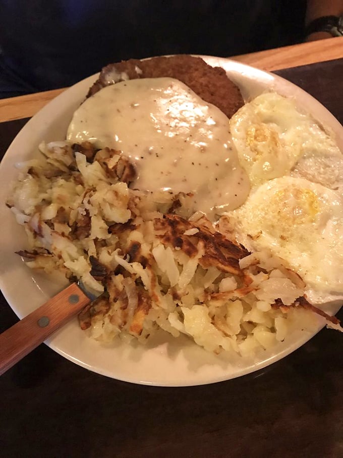 Country fried steak swimming in gravy with eggs and hash browns—the breakfast equivalent of a bear hug from your favorite uncle.