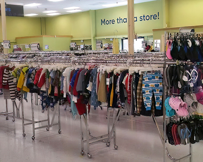 "More than a store!" proclaims the wall, as racks of children's clothing offer growing families budget-friendly fashion solutions.