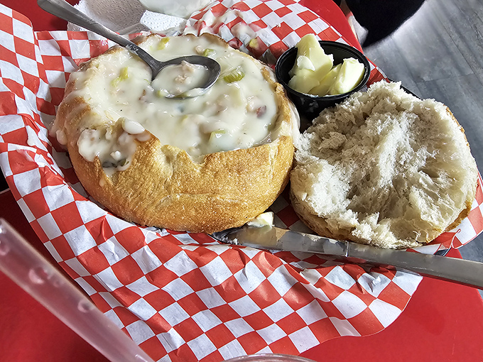 A bread bowl of creamy chowder so hearty it could convert even the most dedicated mountain men into seafood enthusiasts.