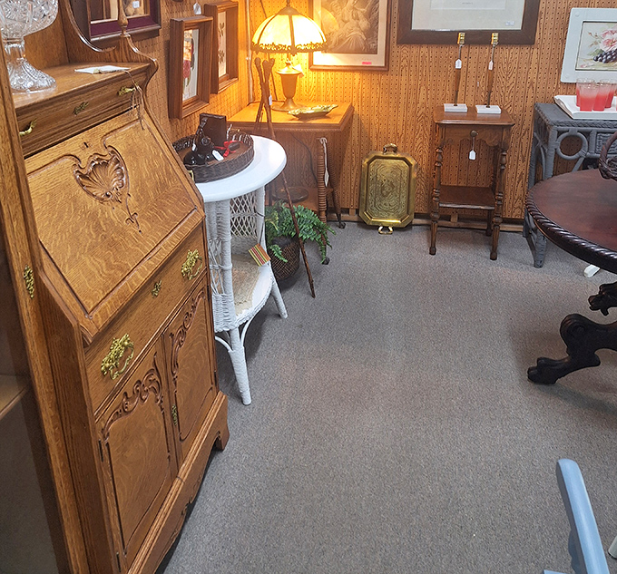 Oak secretary desks and vintage lamps create vignettes so perfect you'll want to move in and start writing letters immediately.