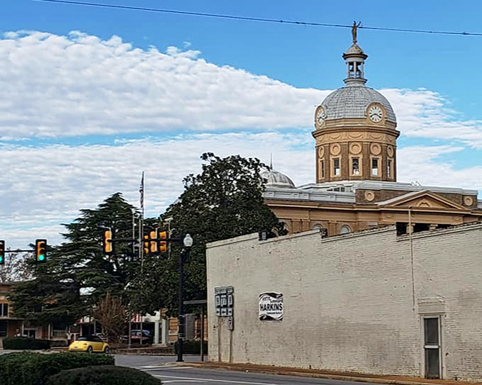 The Clay County Courthouse dome stands like a golden crown atop the town, keeping watch over generations of small-town stories.