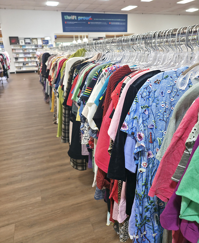 The "Thrift Proud" banner says it all. These racks of possibility represent not just bargains, but sustainable shopping at its most satisfying.