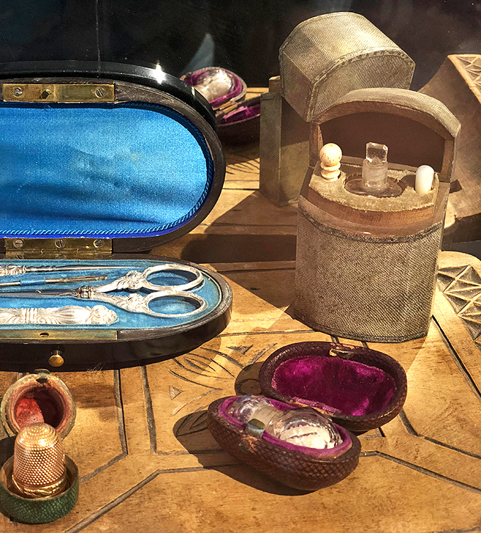 Tiny treasures with enormous stories. That blue-lined sewing kit probably mended garments for people who wrote with quill pens.