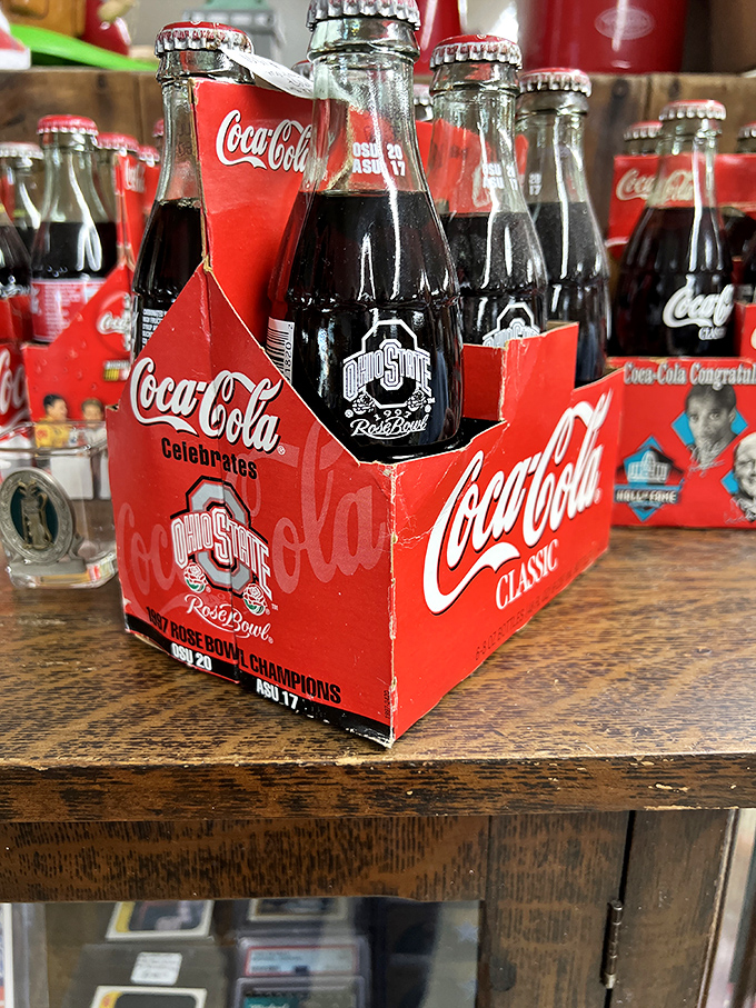 Buckeye pride preserved in carbonated time capsules. These Coca-Cola bottles celebrate Ohio State victories long before social media could.