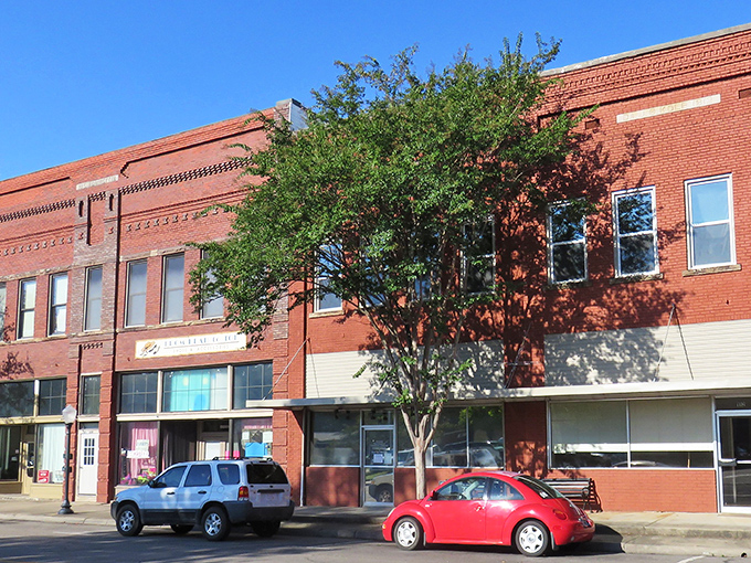 The Commercial Historic District showcases buildings that earned their keep through decades, not architectural trends and tax breaks.