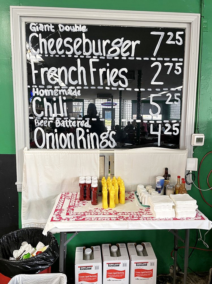 The condiment station stands ready for action. In the burger world, proper accessorizing is everything.