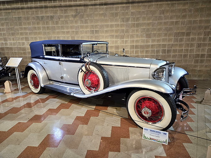 This silver convertible with striking red wheels combines elegance with just a hint of rebellion. Like wearing a tuxedo with sneakers&mdash;and somehow pulling it off.