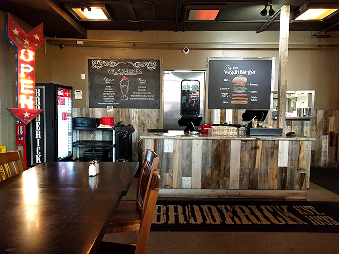 A counter crafted from reclaimed wood speaks to the restaurant's rustic charm. Milkshakes and veggie burgers prove there's something for everyone here.