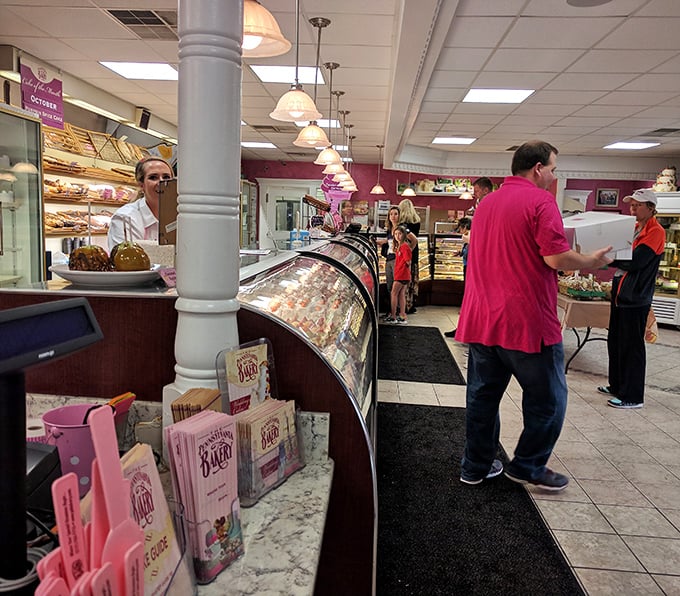 Cozy caf&eacute; corners where wedding cake photos on the wall remind you that life's big moments deserve equally impressive desserts.