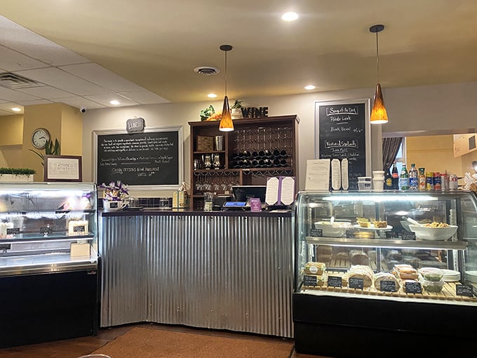 Behind this counter, magic happens daily. The chalkboard menus and glass cases create that perfect "you've discovered something special" feeling that keeps locals coming back.