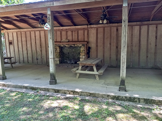 This rustic pavilion with stone fireplace offers shelter for garden events or just a moment of shade. Even paradise occasionally needs a roof.