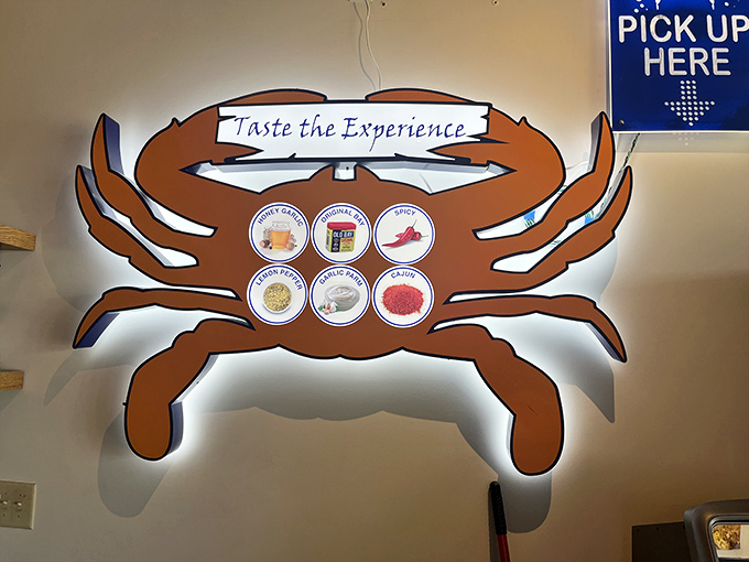 This illuminated crab wall art with "Taste the Experience" isn't just decoration; it's a mission statement in crustacean form.