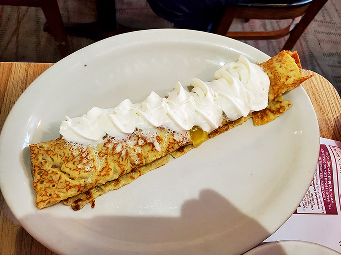 A crepe that's dressed for success&mdash;whipped cream crowning this delicate creation like Maine snow on a perfect winter morning.