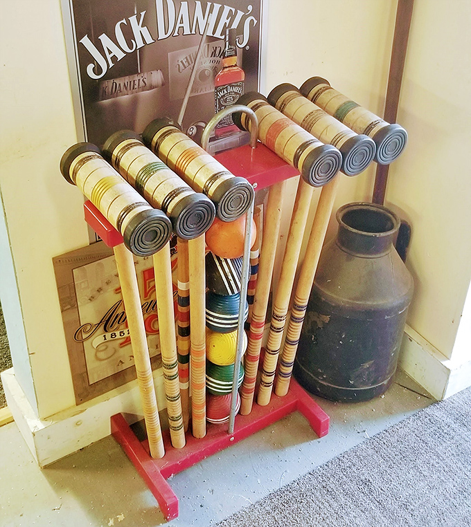 Croquet set display that's part sporting equipment, part American nostalgia. Before video games, this was how families competed on Sunday afternoons.