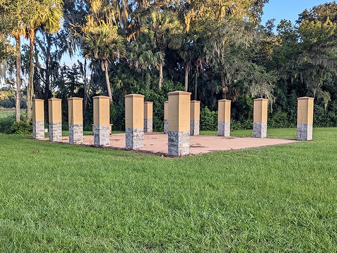 These stately columns stand like sentinels in a grassy field, perhaps waiting for the rest of their building to catch up.