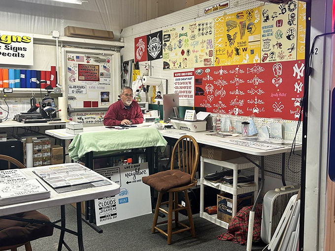 Custom signage booth where someone's actually working, proving that personalization doesn't have to cost your firstborn child's college fund.