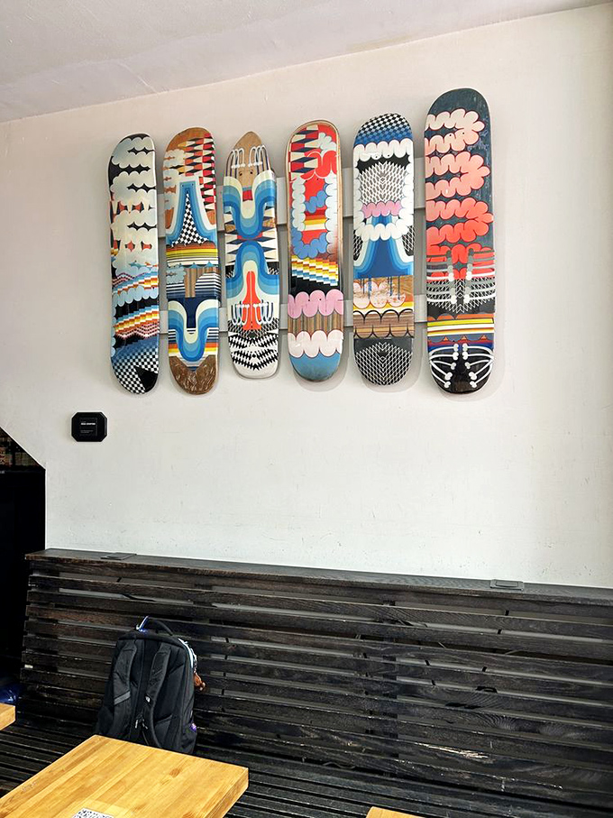 Colorful skateboard decks as wall art&mdash;because even sandwich shops need personality. Urban cool meets culinary excellence in perfect Philadelphia harmony.