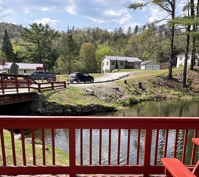 From Dells Trails' red-railed bridge, the pond reflects the surrounding hills&mdash;a perfect spot for contemplating life's big questions or just enjoying lunch.