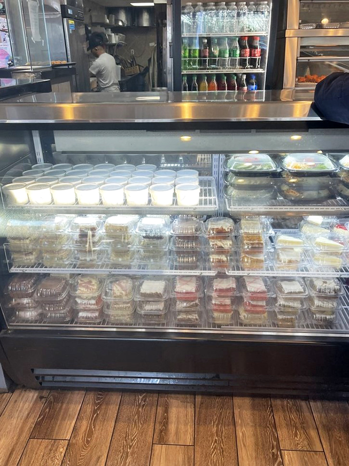 A dessert display showcasing sweet temptations for those who somehow still have room after conquering their main course feast.