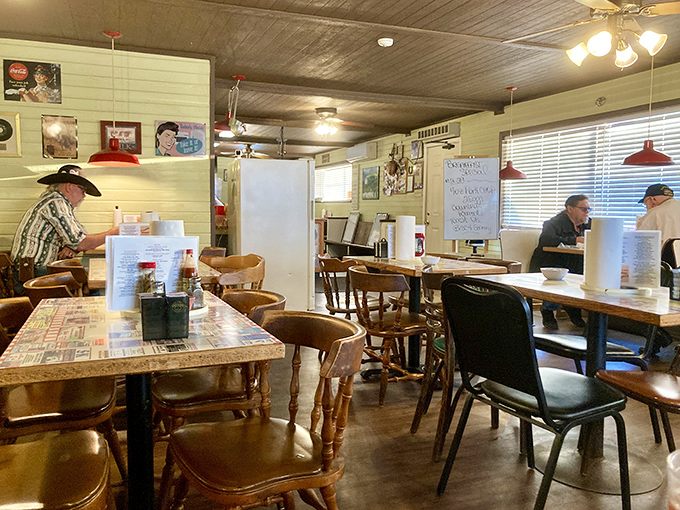 Morning rituals in progress: regulars hunker down with coffee and conversation in a room where everyone feels like a local.