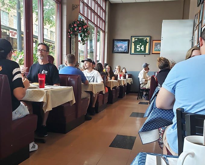 Where strangers become temporary breakfast companions, united by the universal language of "pass the syrup, please."