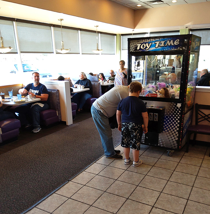 Kids discovering the universal joy of the claw machine while adults discover the joy of not cooking breakfast.