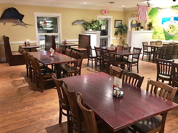 Mounted fish watch over diners like guardians of tradition in this unpretentious temple of seafood worship.