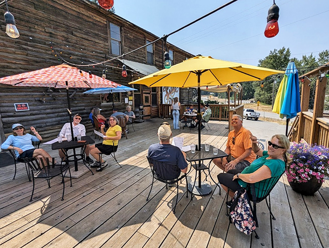 The outdoor patio offers mountain air with your meal&mdash;where conversations flow as freely as the nearby Coeur d'Alene River on a perfect Idaho afternoon.
