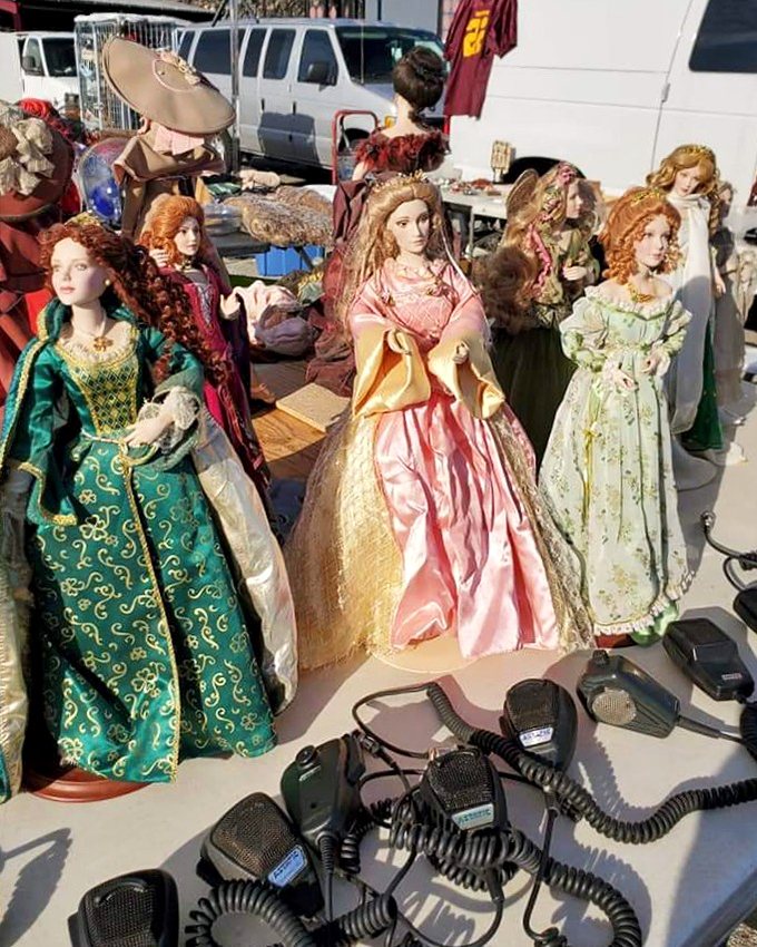 A royal court of porcelain ladies stands sentinel over vintage electronics. Yesterday's treasures waiting patiently for tomorrow's collectors.