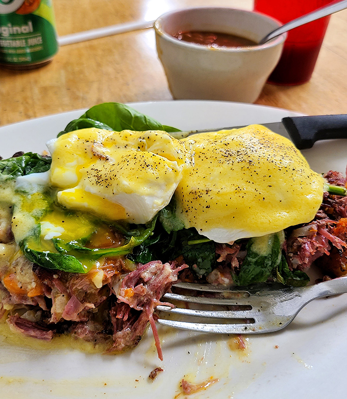 Eggs Benedict with corned beef hash &ndash; a breakfast masterpiece that makes you want to applaud the chef between bites.