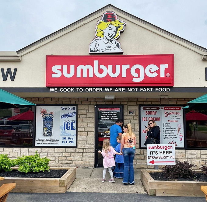 Families making memories at the entrance, where the "Since 1953" sign isn't just a date&mdash;it's a testament to doing things right for generations.