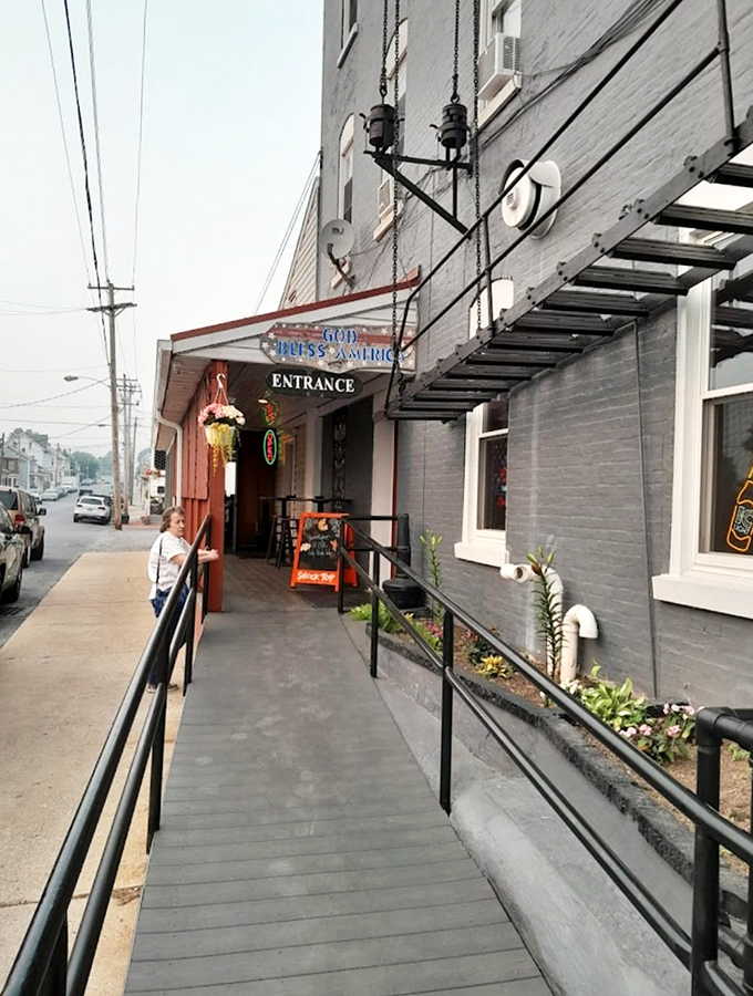 The entrance beckons like a portal to deliciousness. That ramp isn't just for accessibility&mdash;it's your runway to flavor town.