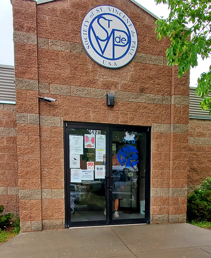 The official entrance welcomes shoppers with the promise of treasures within and the satisfaction of supporting community programs.