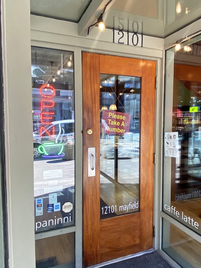 "Please Take A Number" might as well say "Prepare For Deliciousness." This wooden door has welcomed carb enthusiasts for decades.