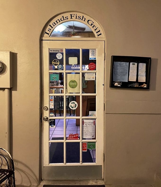 The entrance that separates ordinary days from extraordinary meals. That arched doorway is a portal to seafood nirvana.