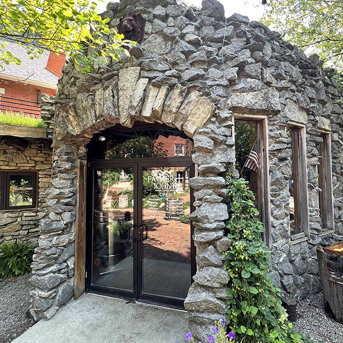 Father John's stone archway entrance suggests medieval castle meets neighborhood pub &ndash; and somehow it totally works.