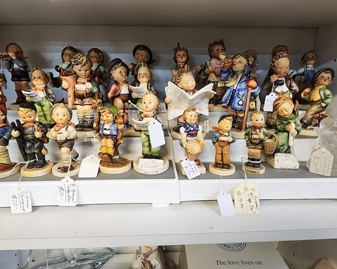 Hummel figurines stand in formation, each cherubic face telling its own story. Grandmothers everywhere are nodding in approval at this collection.