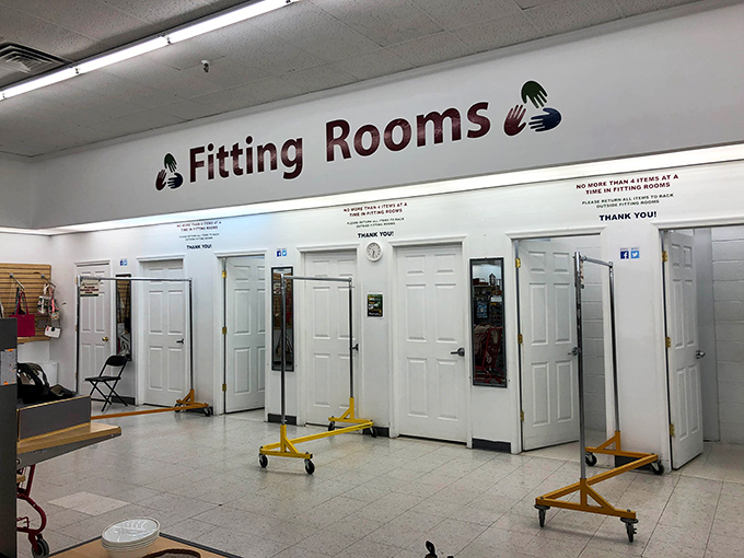 Fitting rooms await the "maybe" pile, where retail therapy meets reality in the moment of truth behind those white doors.
