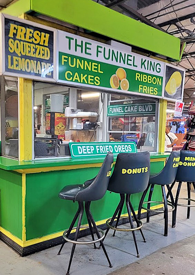 The Funnel King's court serves up fried indulgences that make diet plans vanish faster than your willpower. Those deep-fried Oreos are calling.