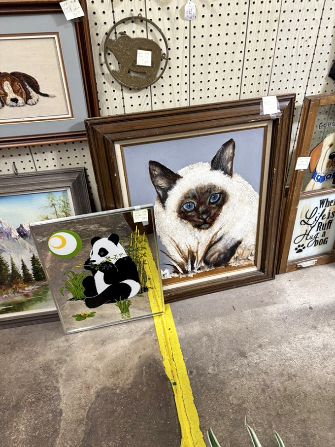Wall art ranging from "perfect for the cabin" to "so-bad-it's-good" &ndash; including a Siamese cat portrait that will either haunt or delight you.