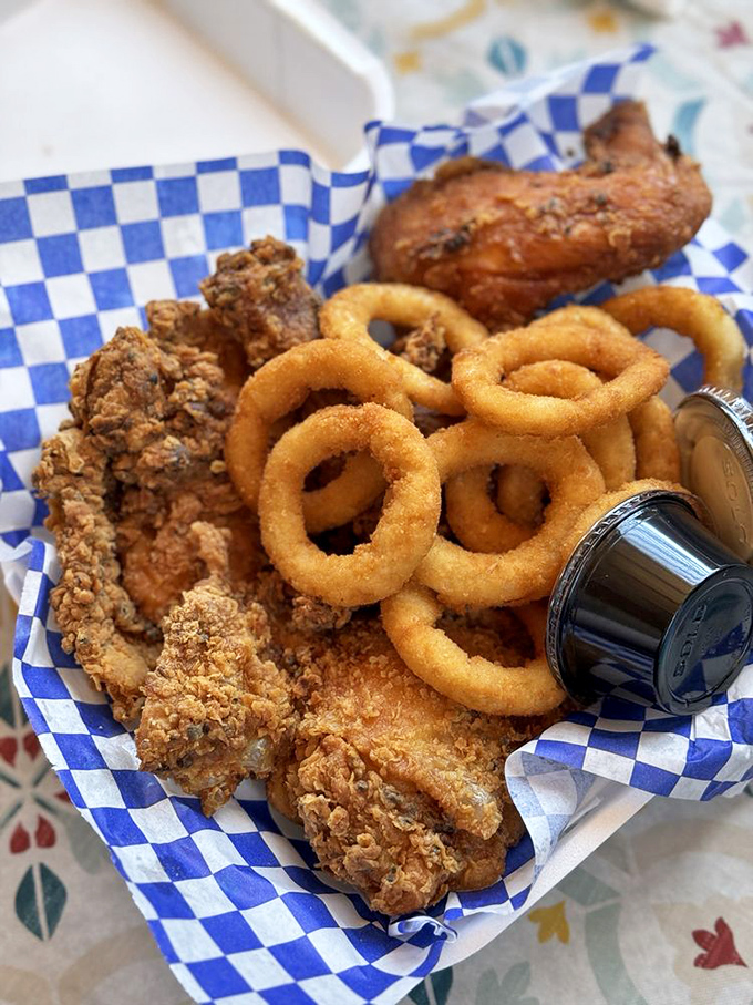 Crispy fried chicken and golden onion rings&mdash;a dynamic duo of comfort food that makes calorie-counting seem like a problem for tomorrow. 