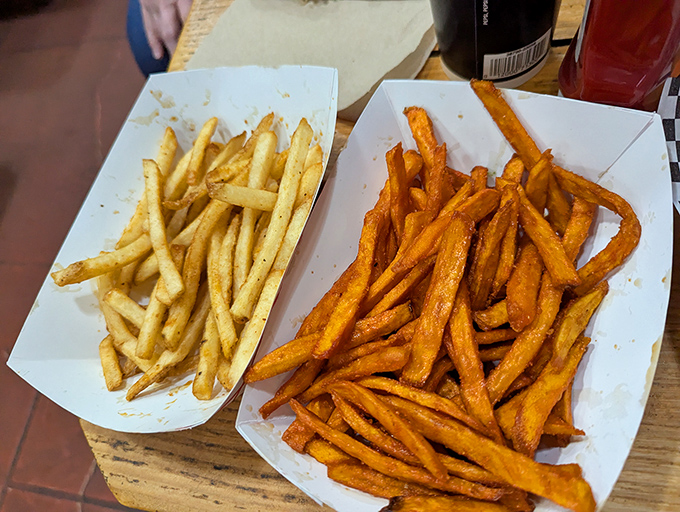 Sweet potato fries and regular fries face off in the ultimate showdown of crispy golden goodness.
