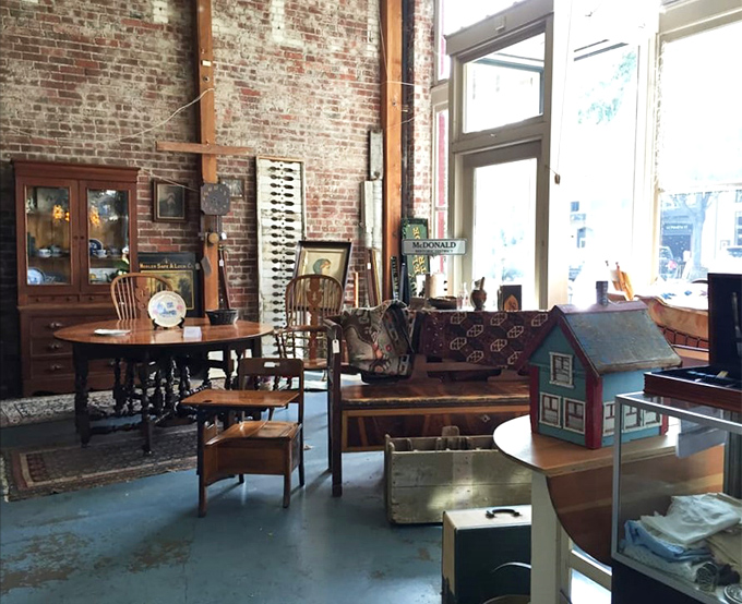 A perfectly staged vignette of timeless furniture. That antique desk has probably witnessed more thoughtful correspondence than all of today's text messages combined.