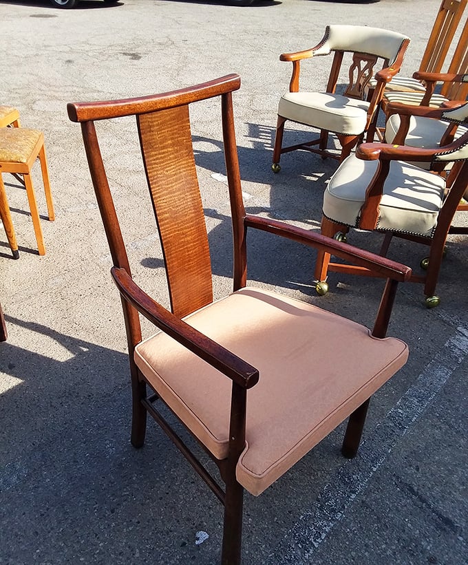 Mid-century chairs bask in California sunshine, their clean lines and warm wood tones practically begging for a second act.