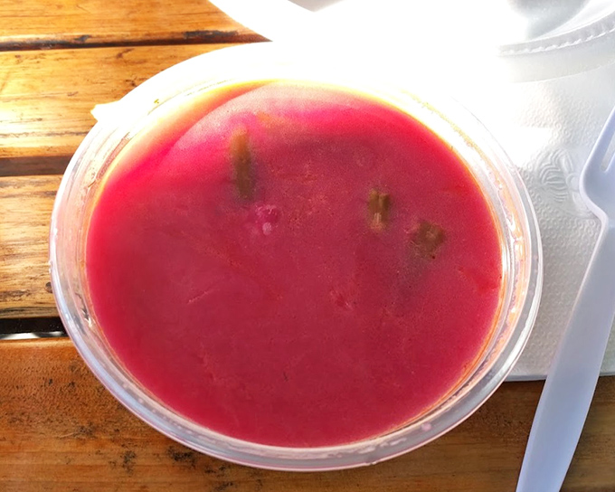 Vibrant borscht that looks like it could power a small city. Eastern European liquid sunshine in a bowl.